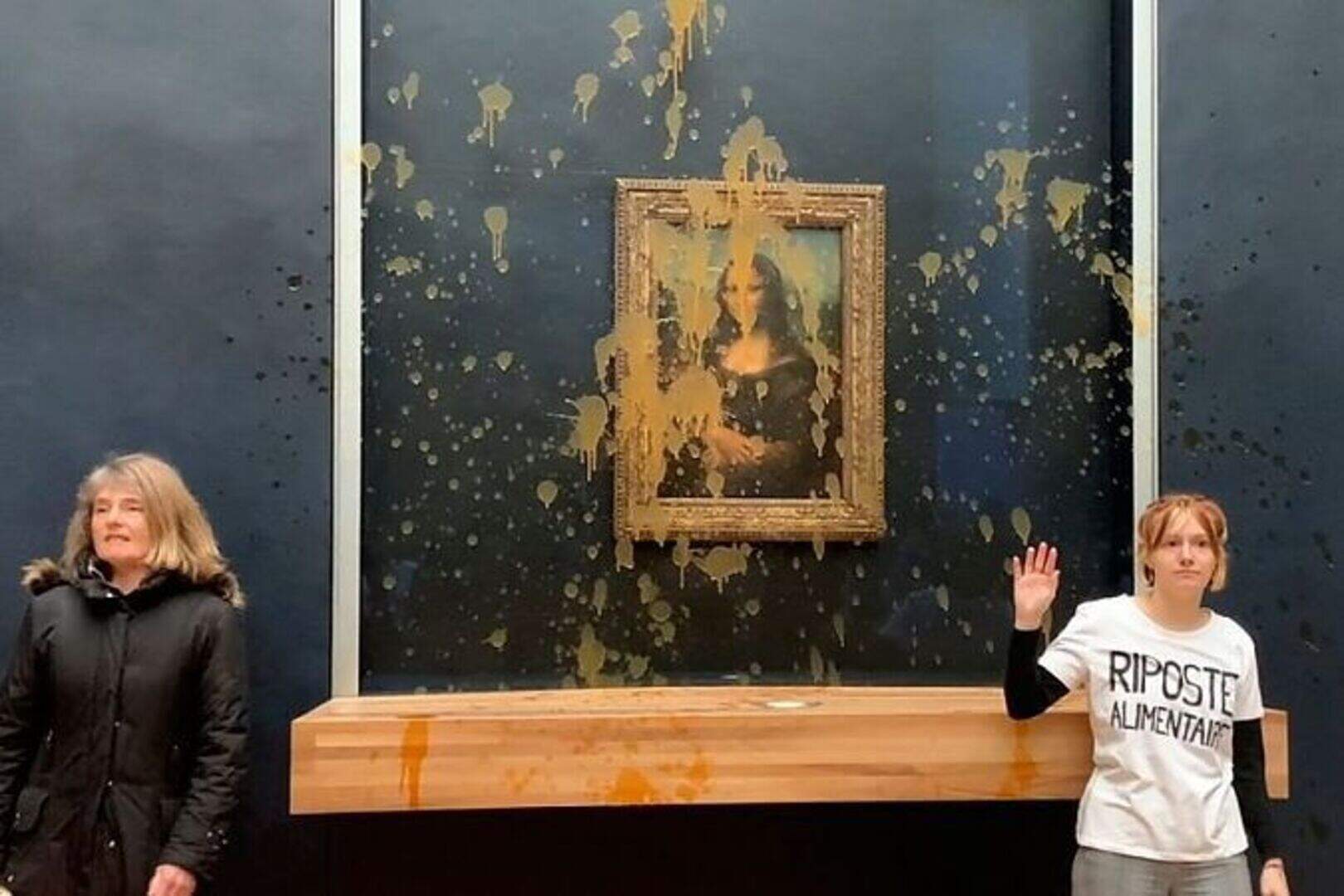 Protesters throw soup at Mona Lisa painting in the Louvre, Paris ...