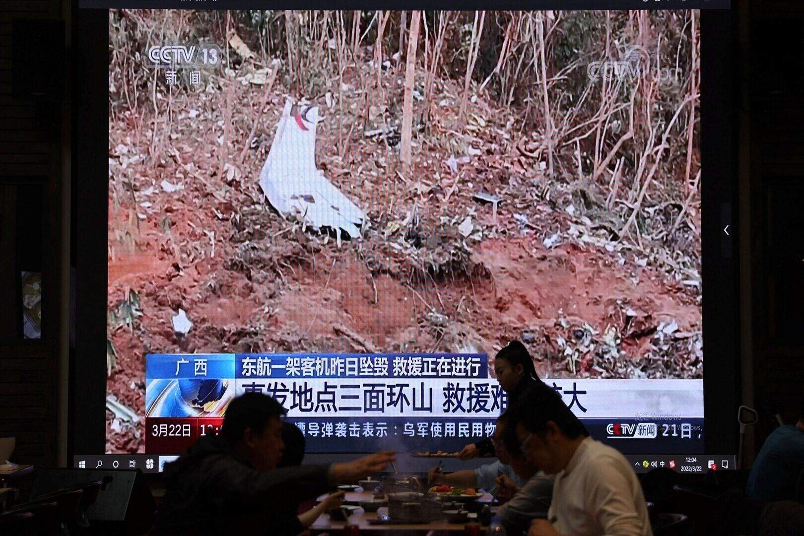 China plane crash: Rescue teams search for victims and flight recorders ...
