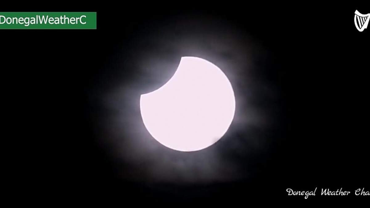 Partial solar eclipse sees around a quarter of the sun blocked out in ...