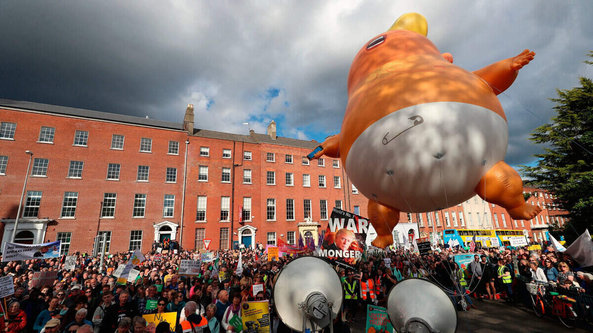 Baby blimp takes to the skies as hundreds protest | Irish Independent