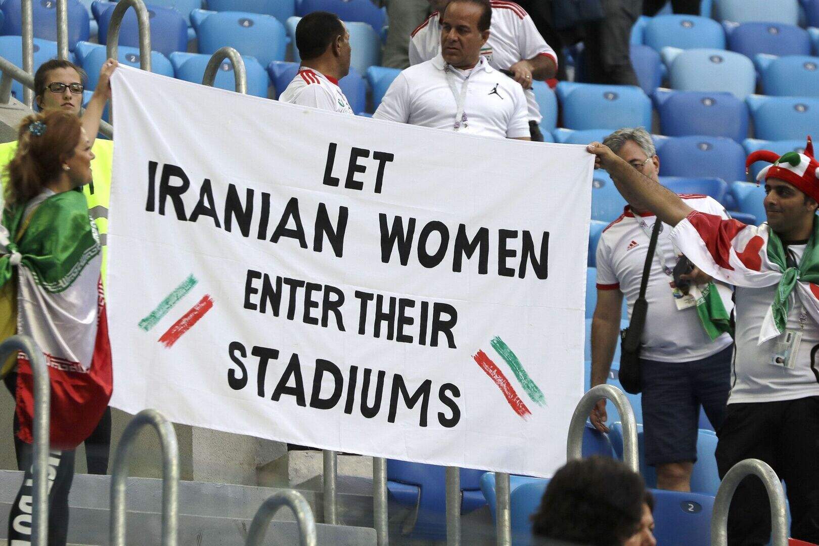 Iran fans stage World Cup protest over ban on women at football games ...