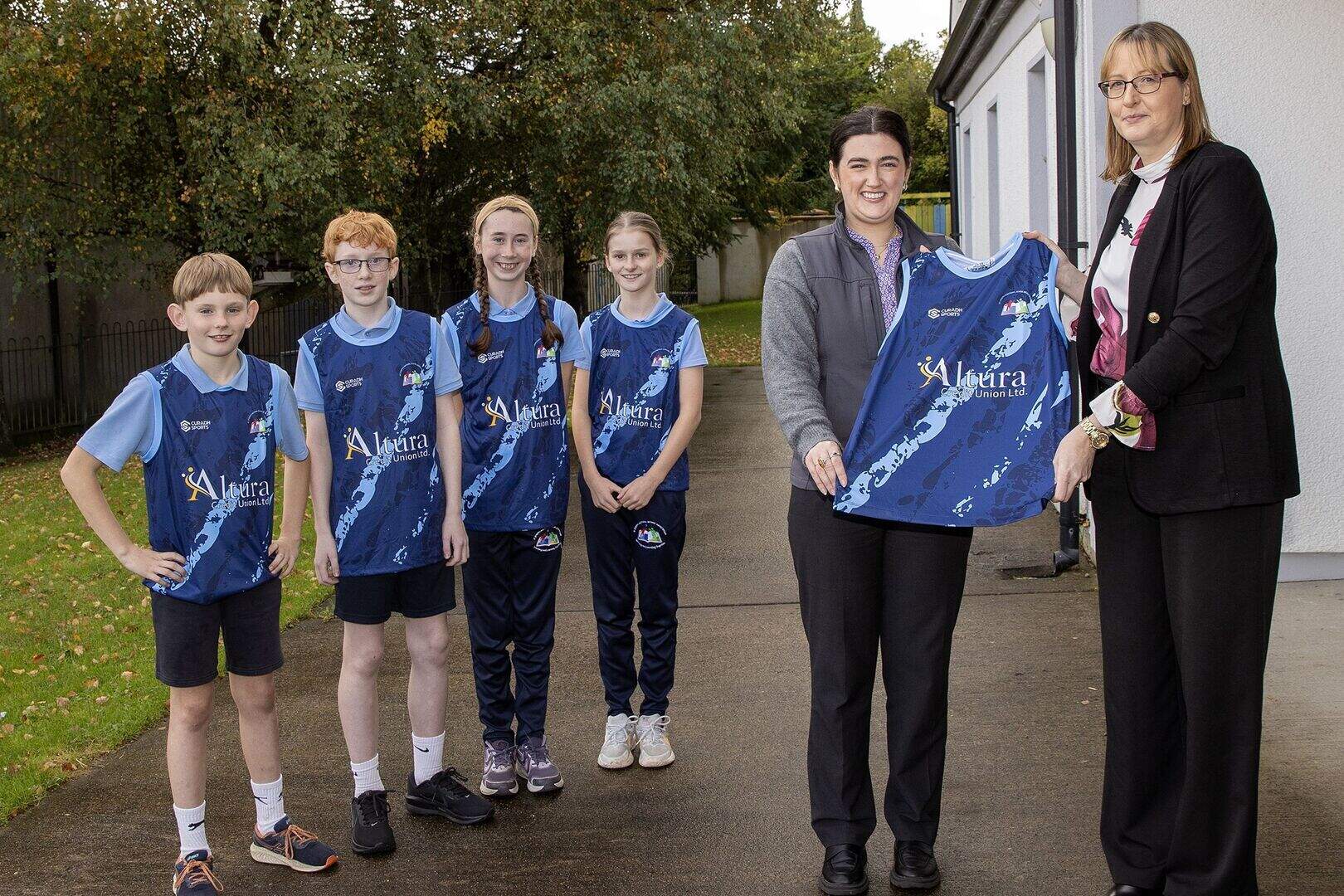 Wicklow credit union gifts Carlow border school 30 new athletics tops ...
