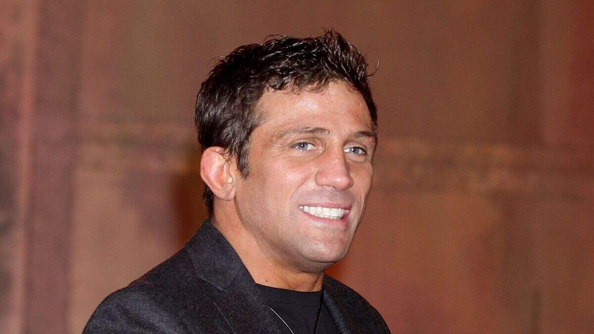 Cage fighter Alex Reid wins court injunction against ex-wife Katie ...