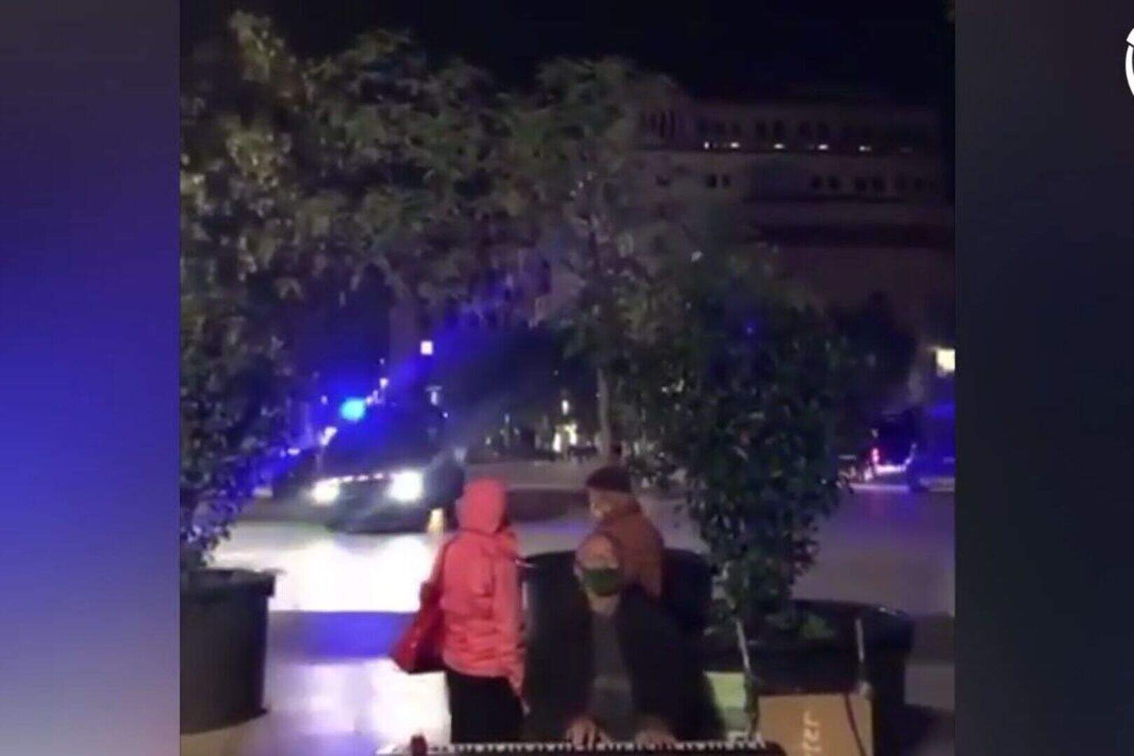Pianist gently plays 'Eternal Flame' whilst riot ensues behind him in ...