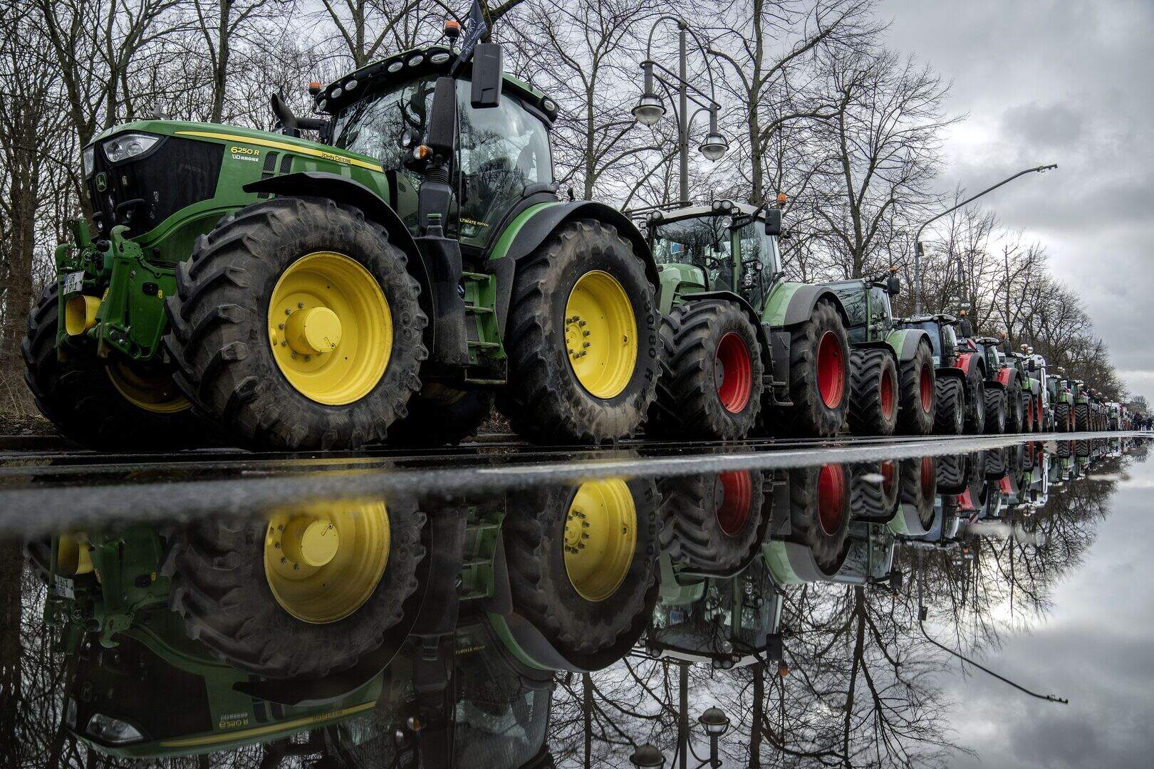 Farmers drive thousands of tractors into Berlin in fuel subsidy cuts ...