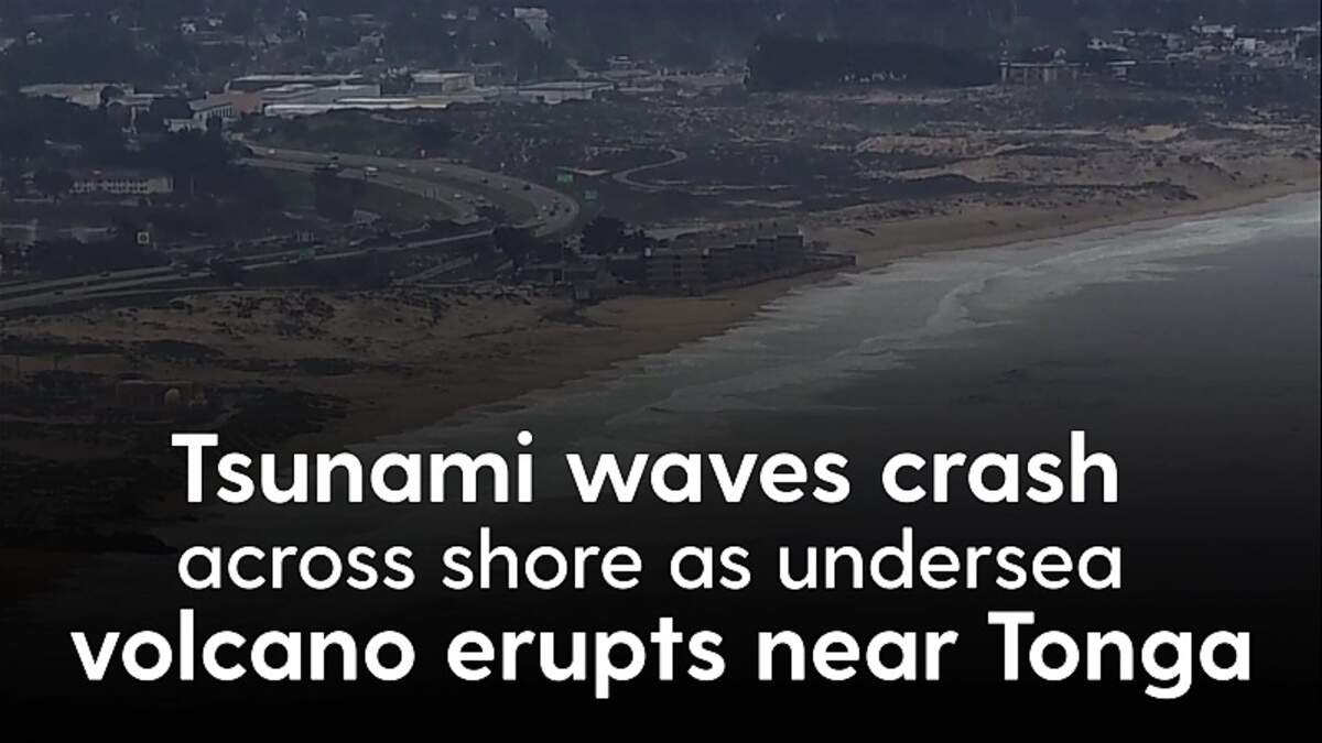 Tsunami waves crash across shore as undersea volcano erupts near Tonga ...