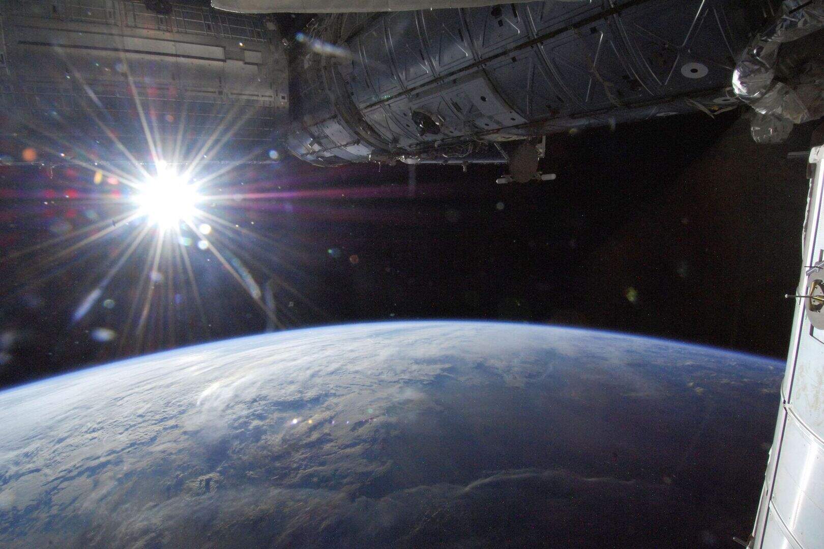 Astronauts return to International Space Station after evacuation fears ...