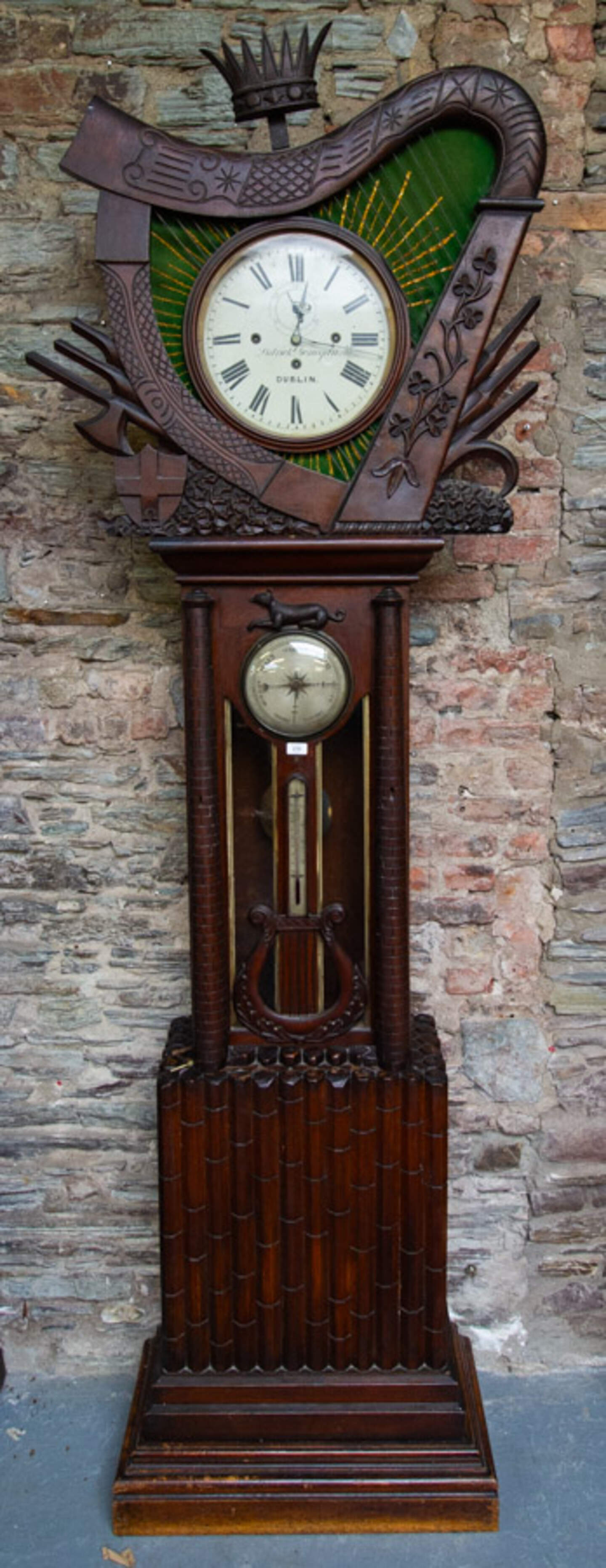 In the salerooms: Irish oak harp clock, Louis XV walking cane handle ...