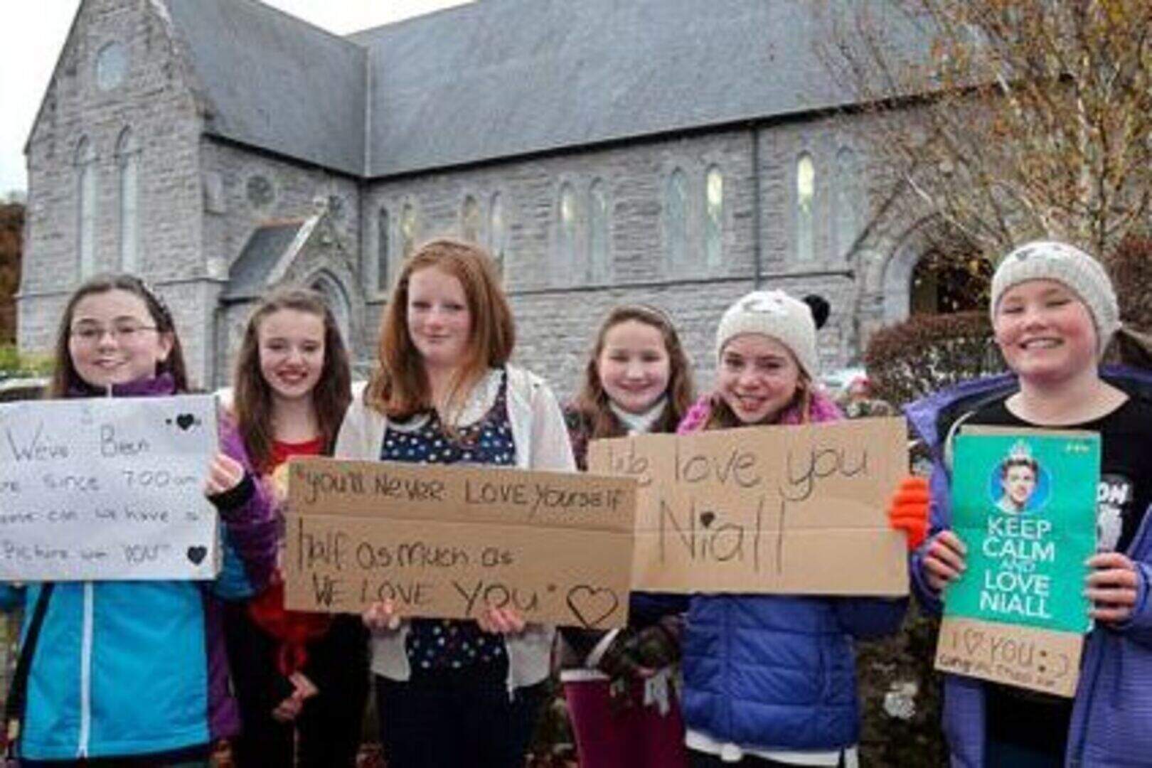 Mystery woman steals the limelight as Niall Horan pleads for family ...