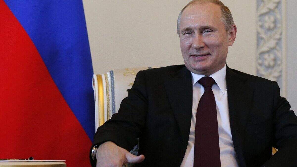 Putin appears healthy after absence | Irish Independent