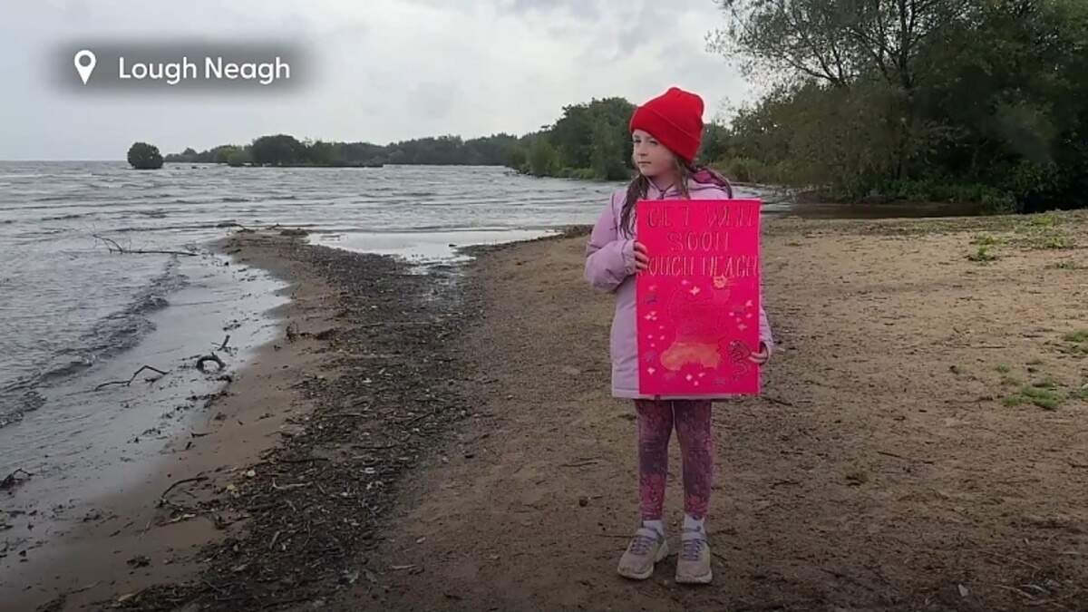 Environmentalists hold ‘wake’ for Lough Neagh over toxic algae bloom ...