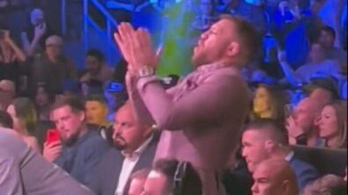 Conor McGregor gives former UFC rival Eddie Alvarez advice during bare ...
