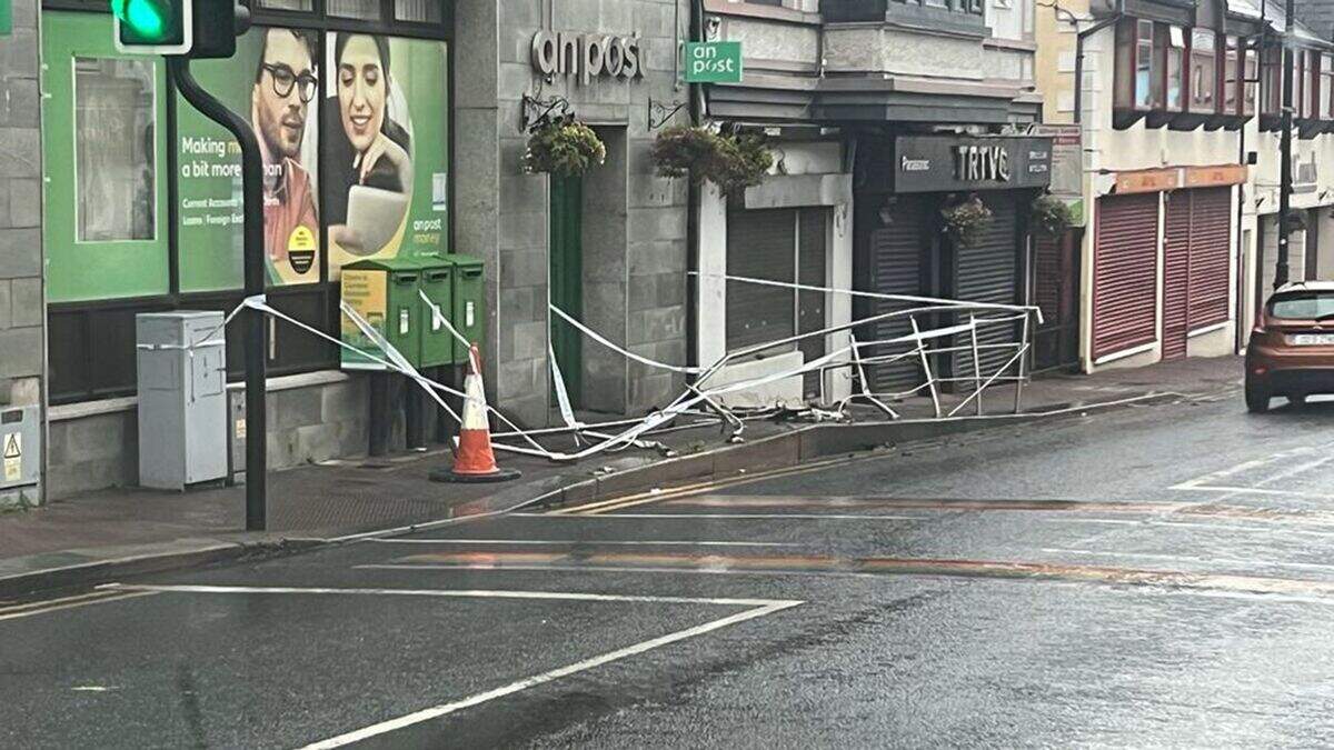 Car crash mangles railings at Arklow post office | Irish Independent
